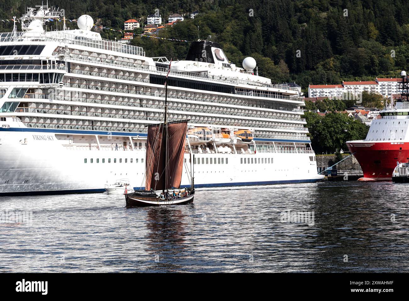 A replica viking sailing vessel carrying passengers for sightseeing ...