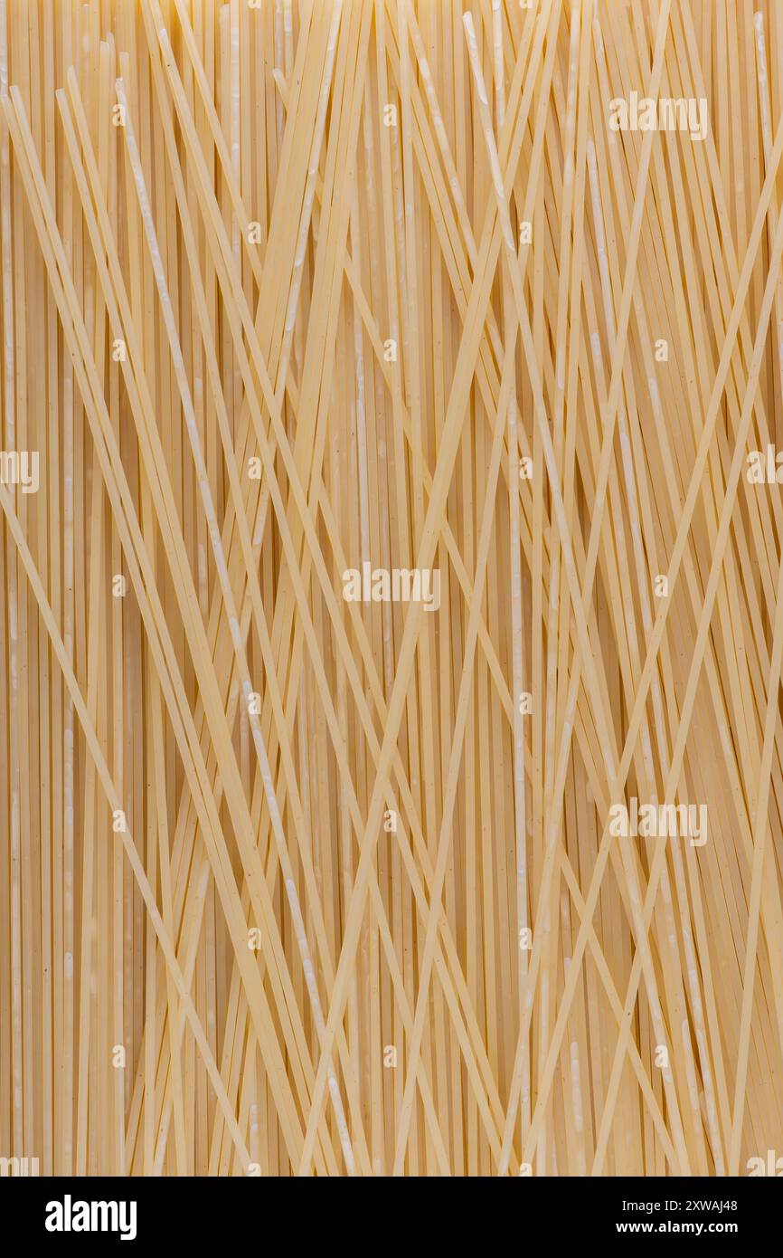 Raw spaghetti texture. Dry uncooked wholegrain italian pasta spaghetti ...