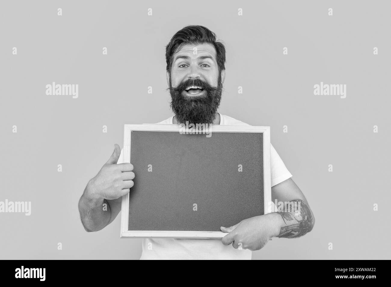 happy man offer advertisement in studio. photo of man offer ...
