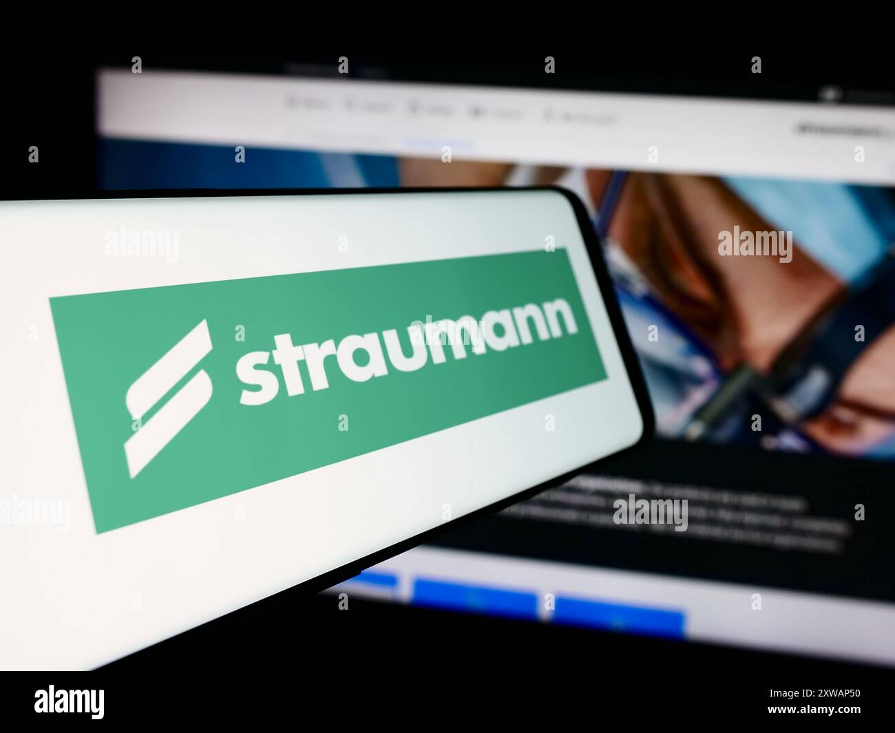 Straumann holding hi-res stock photography and images - Alamy