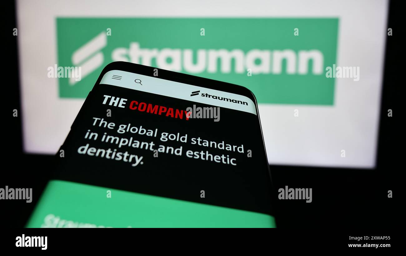 Mobile phone with website of Swiss medical devices company Straumann ...