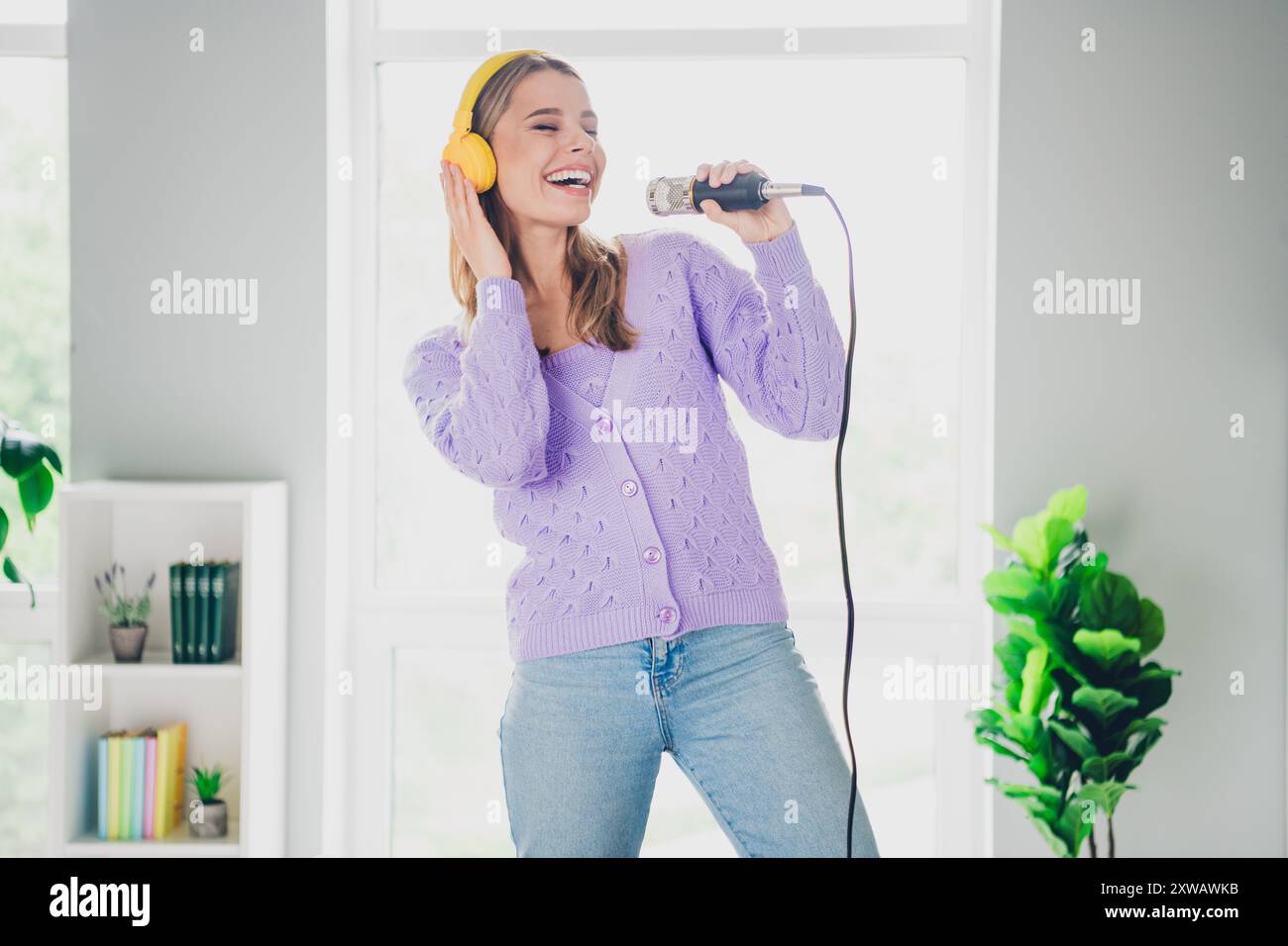 Photo of attractive young woman headphones sing karaoke mic song ...