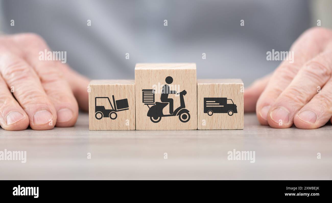 Wooden blocks with symbol of delivery concept Stock Photo - Alamy