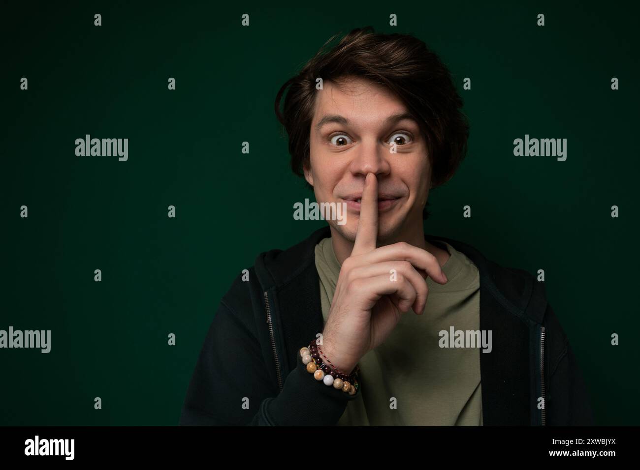 Man Making Funny Face With Finger Stock Photo - Alamy
