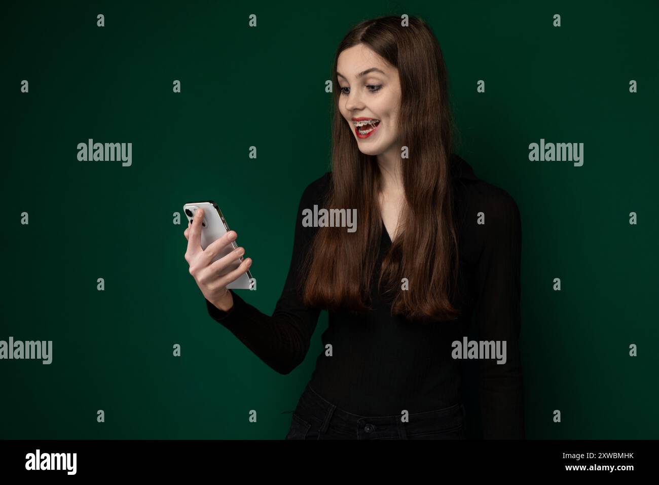 Woman Holding Nintendo Wii Game Controller Stock Photo - Alamy