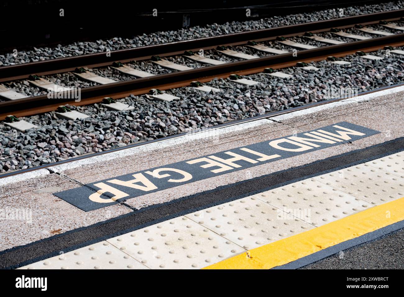 Mind the Gap sign on railway platform edge, Nuneaton, UK Stock Photo ...