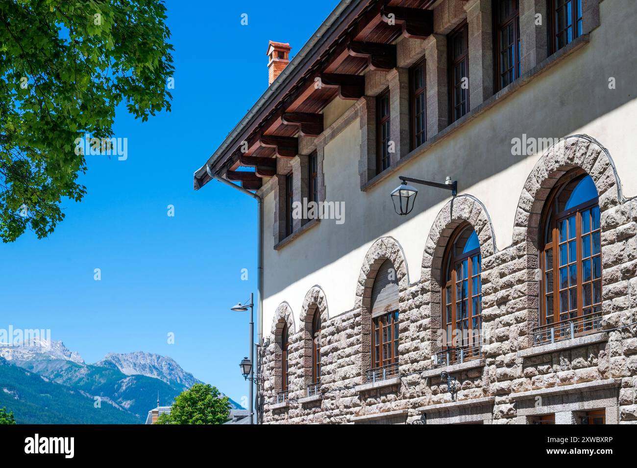 The alpine-style town hall of Barcelonette, southern Alps, France Stock ...