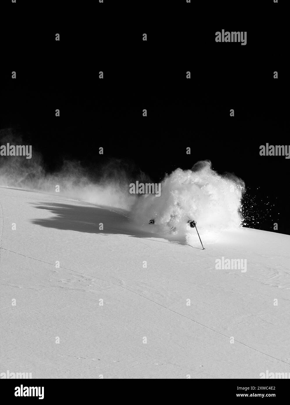 Skier while deep snow skiing Black and White Stock Photos & Images - Alamy