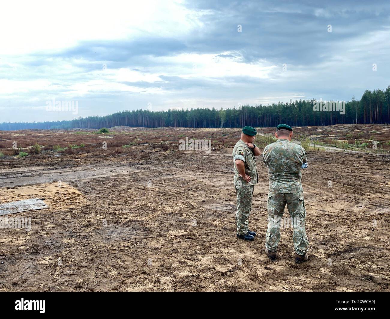 Rudninkai, Lithuania. 19th Aug, 2024. Lithuanian soldiers stand at the ...