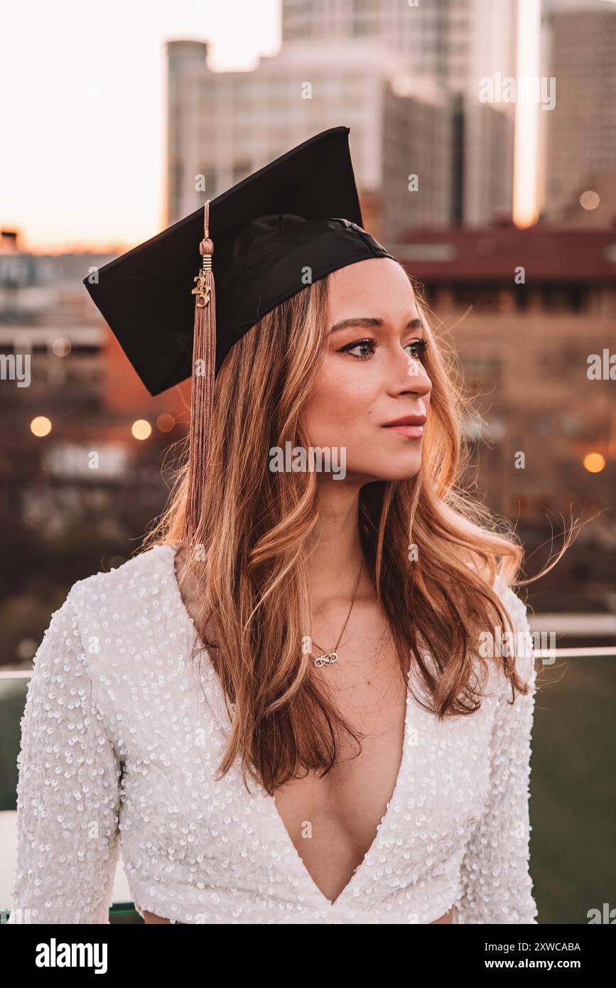 College Graduation Portraits on Rooftop Downtown Stock Photo - Alamy