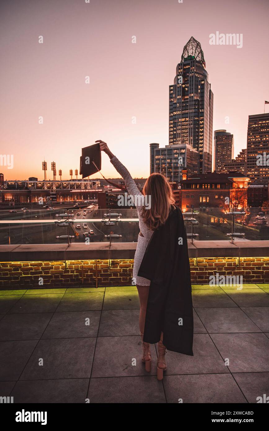 College Graduation Portraits on Rooftop Downtown Stock Photo - Alamy