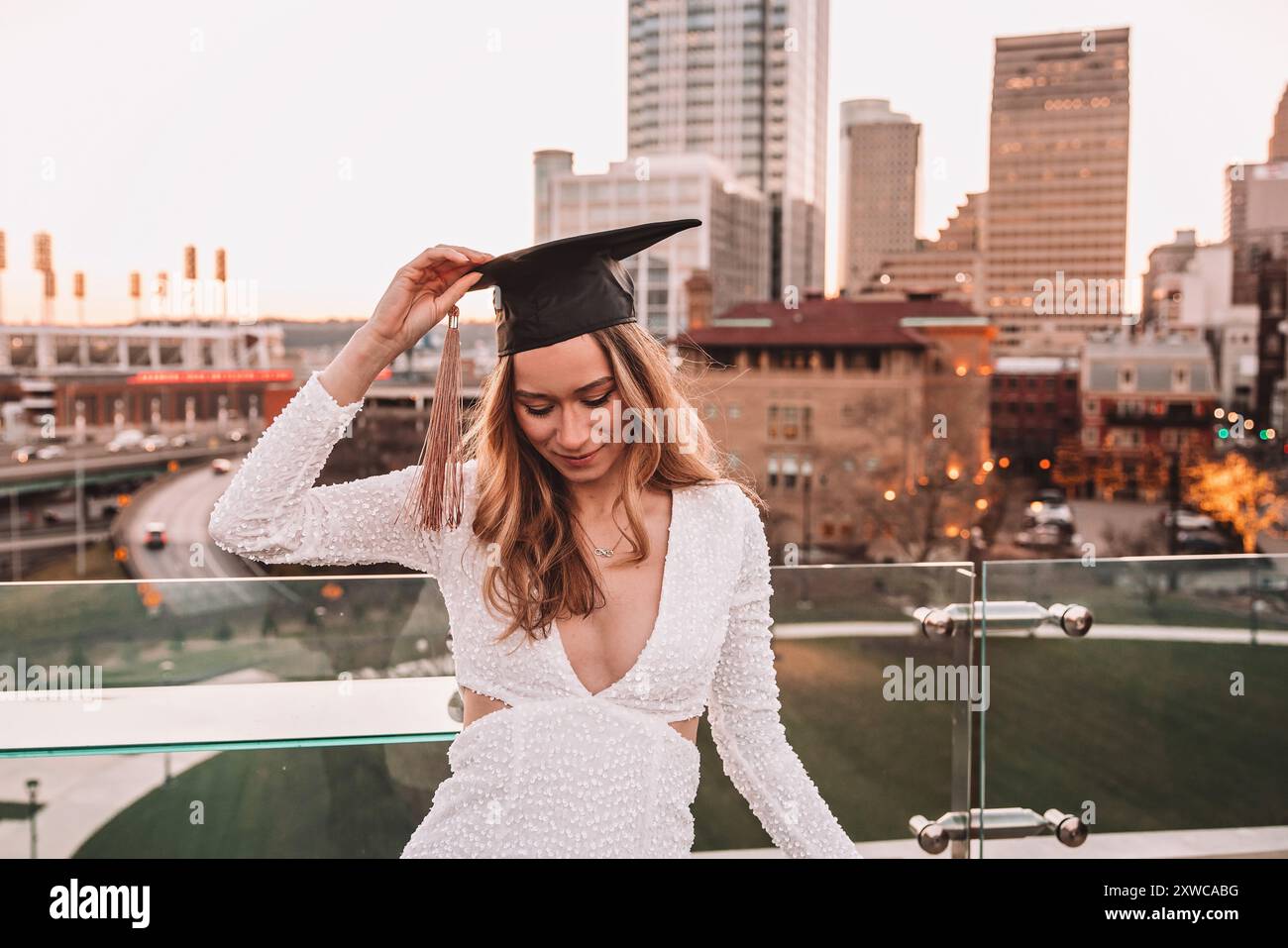 College Graduation Portraits on Rooftop Downtown Stock Photo - Alamy