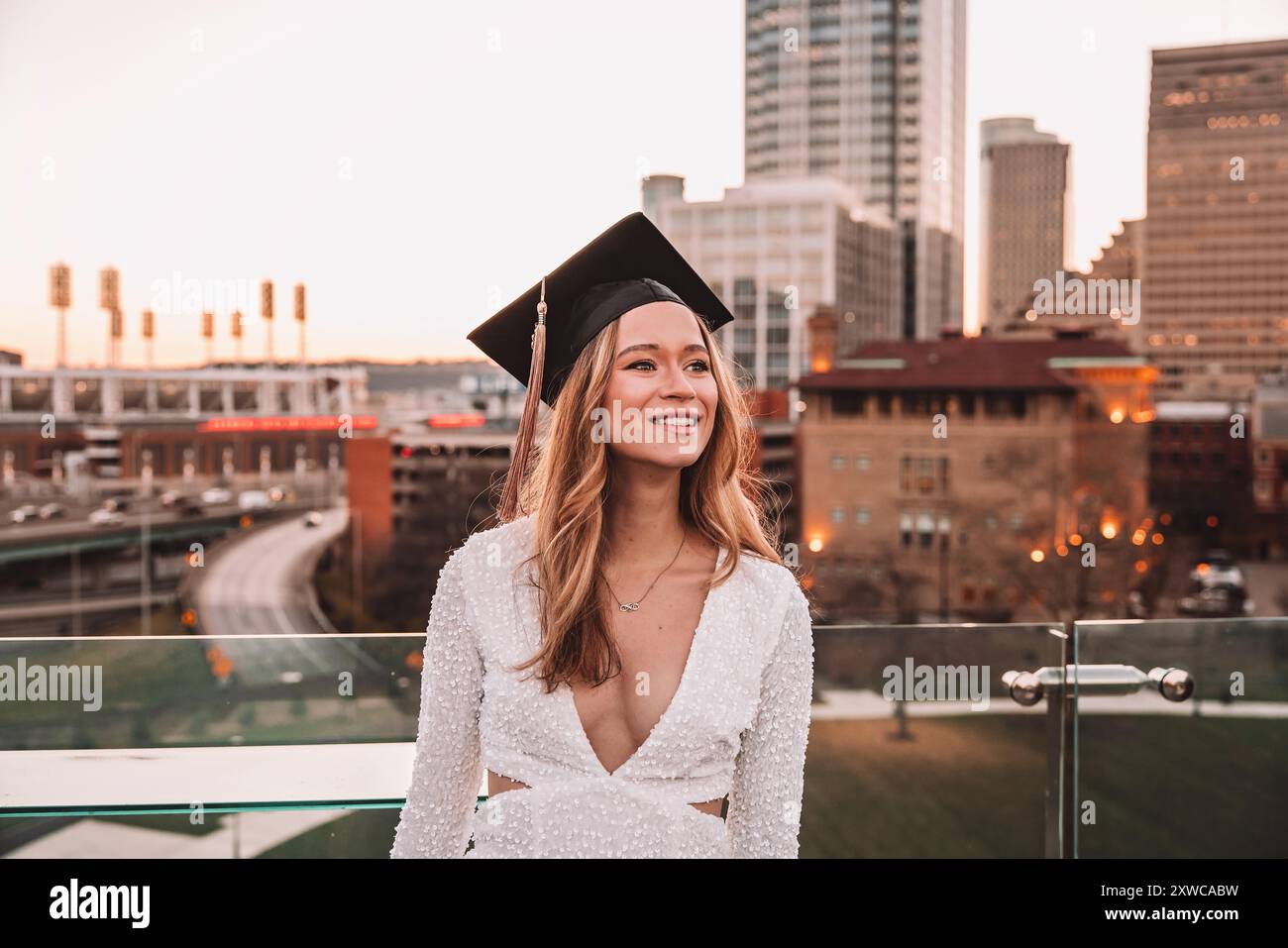 College Graduation Portraits on Rooftop Downtown Stock Photo - Alamy