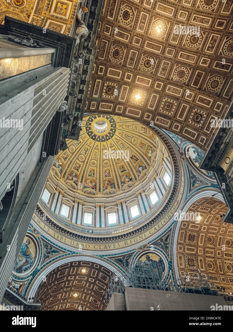 The ceiling of a cathedral is covered in gold and blue tiles Stock ...