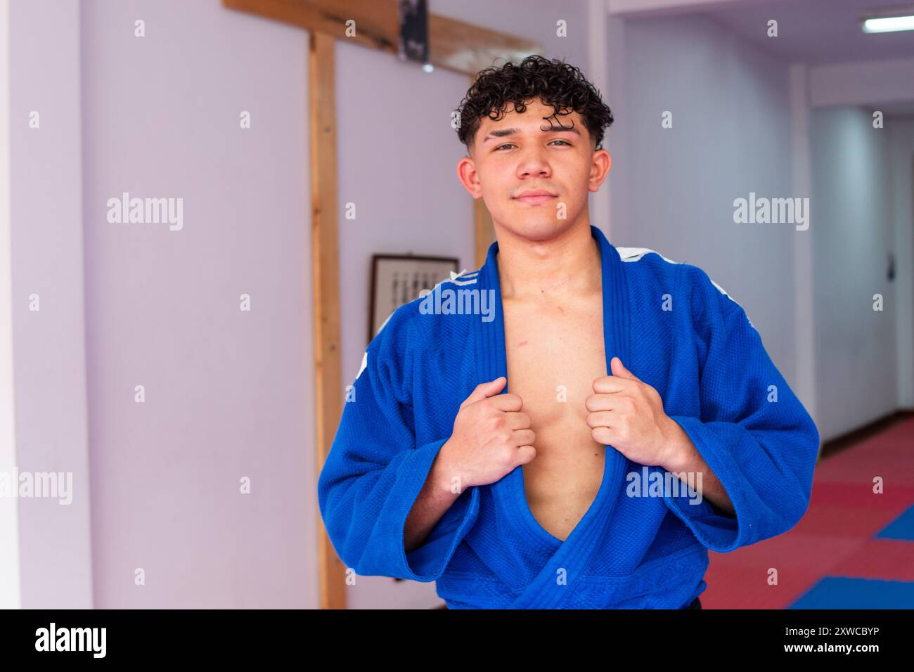 Judo fighter portrait in dojo Stock Photo - Alamy