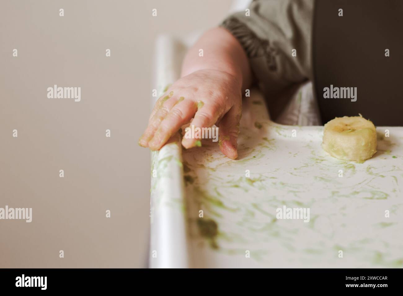 Child highchair fingers food hi-res stock photography and images - Alamy