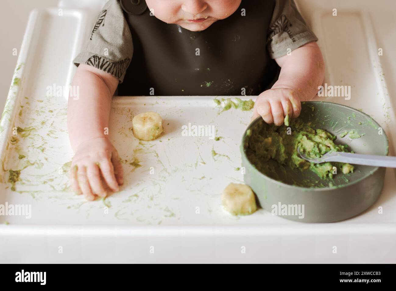 Child highchair fingers food hi-res stock photography and images - Alamy