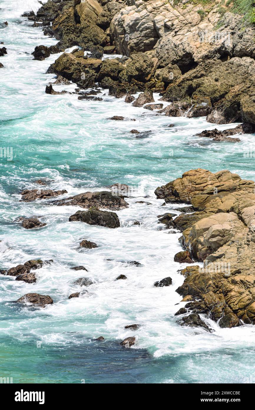 Overhead view of waves in the sea on rocks. Oaxaca, Mexico Stock Photo ...