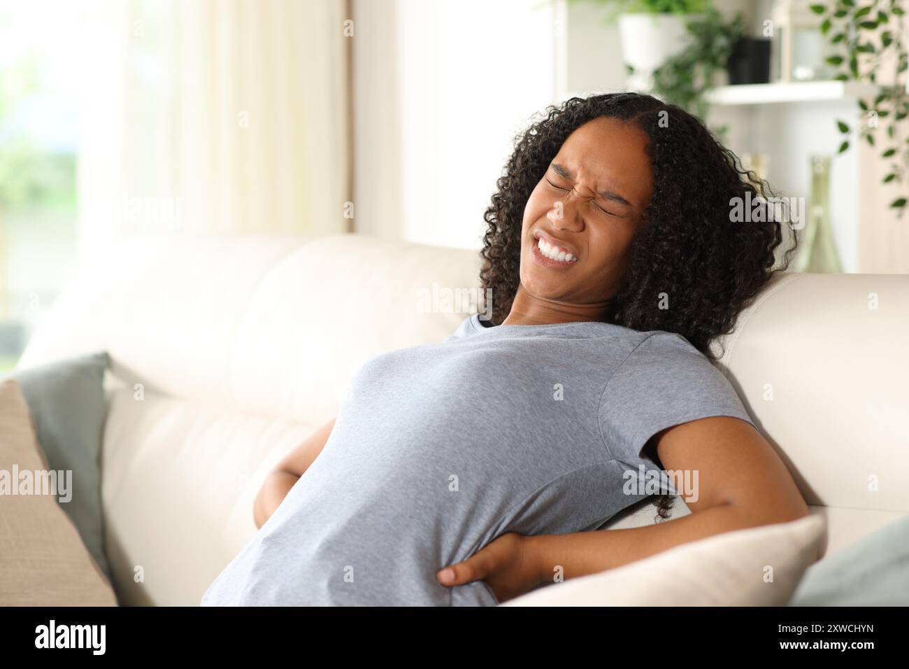 Back muscular african american woman hi-res stock photography and ...