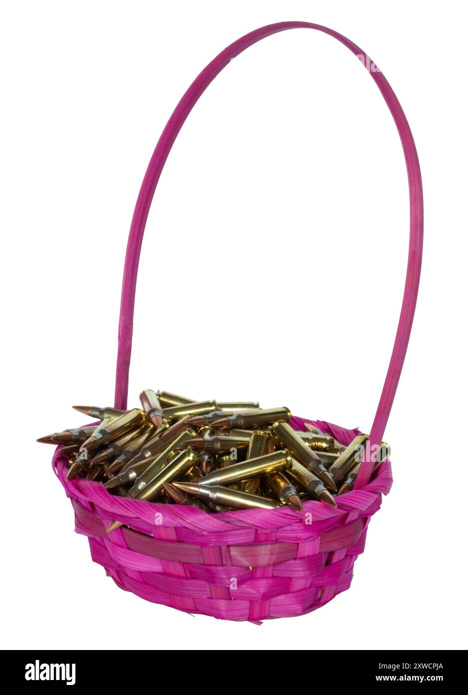 Rifle cartridges fill a bright pink Easter basket isolated in a studio ...