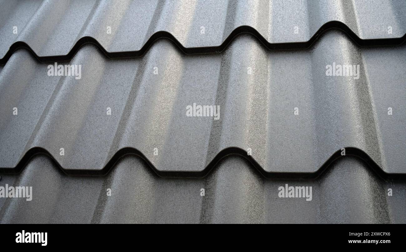 Close-up view lightweight galvanised steel roofing sheet. Modular tile ...