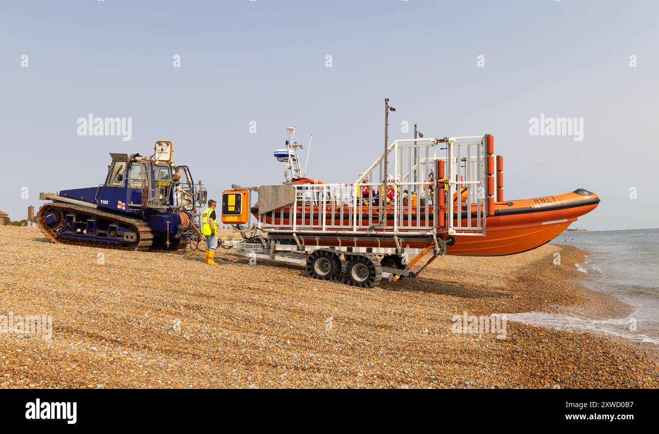 RNLI Atlantic 85 lifeboat being prepared for launch on the beach for a ...