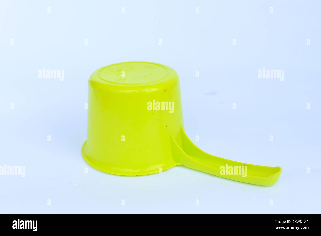 green water dipper for bathing Stock Photo - Alamy