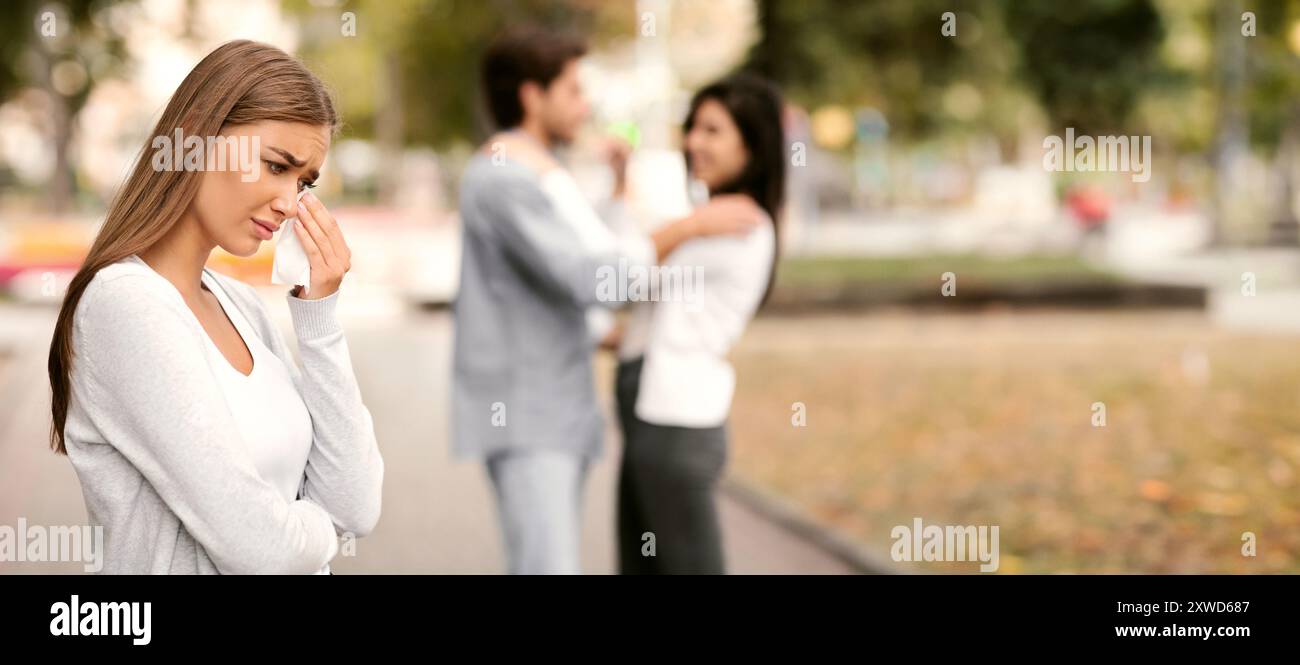 Girl Crying Seeing Boyfriend Hugging Other Woman In Park Stock Photo ...