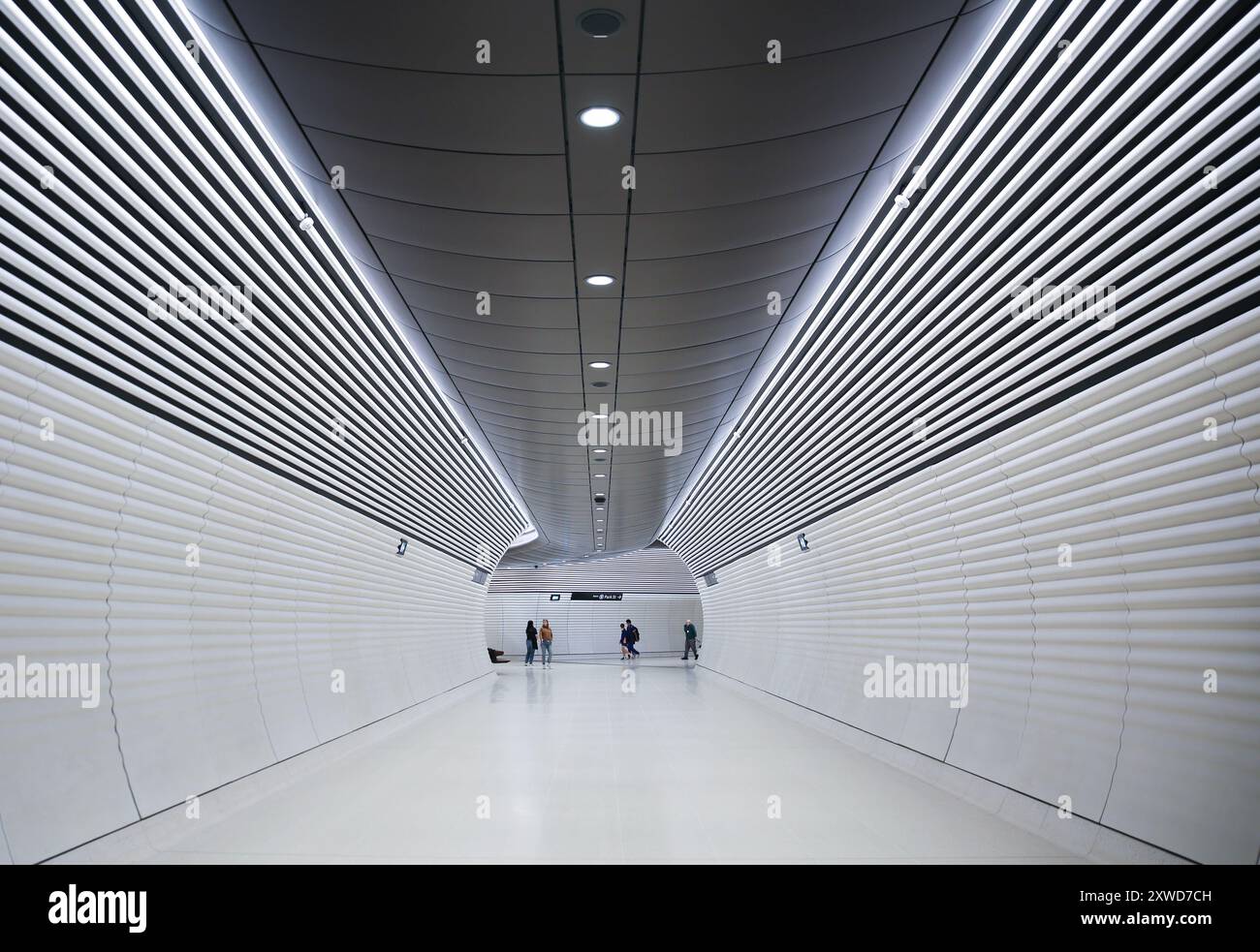 Sydney, Australia. 19th Aug, 2024. Passengers walk inside the metro station of Gadigal in Sydney ...