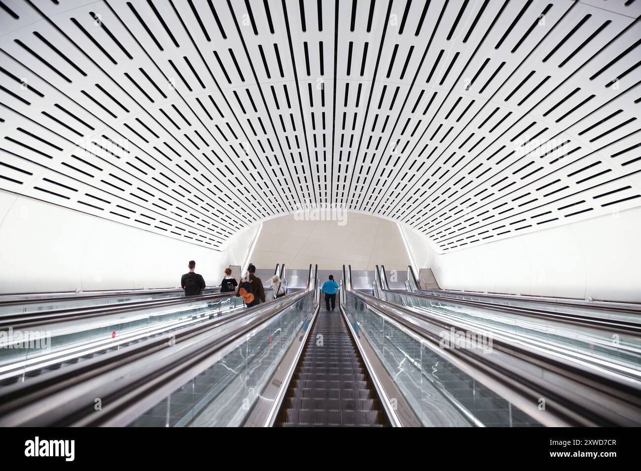 Sydney, Australia. 19th Aug, 2024. Passengers take escalators inside the metro station of ...