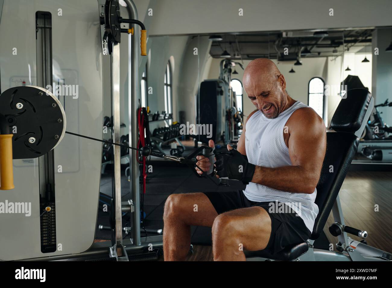 Man pumping muscles on training hi-res stock photography and images - Alamy