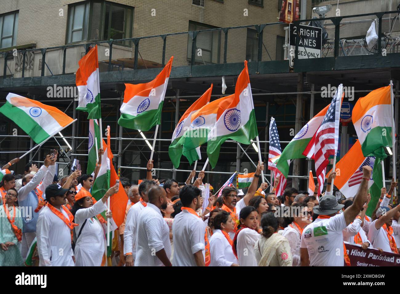 People marching with Indian flags in the annual India Day Parade in New ...