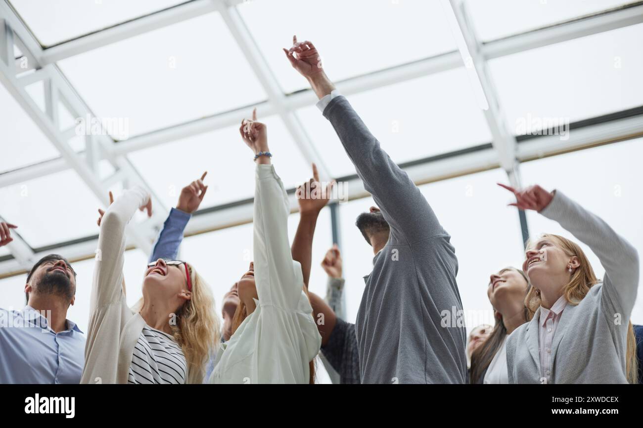 multi-ethnic men and women raise their hands Stock Photo - Alamy