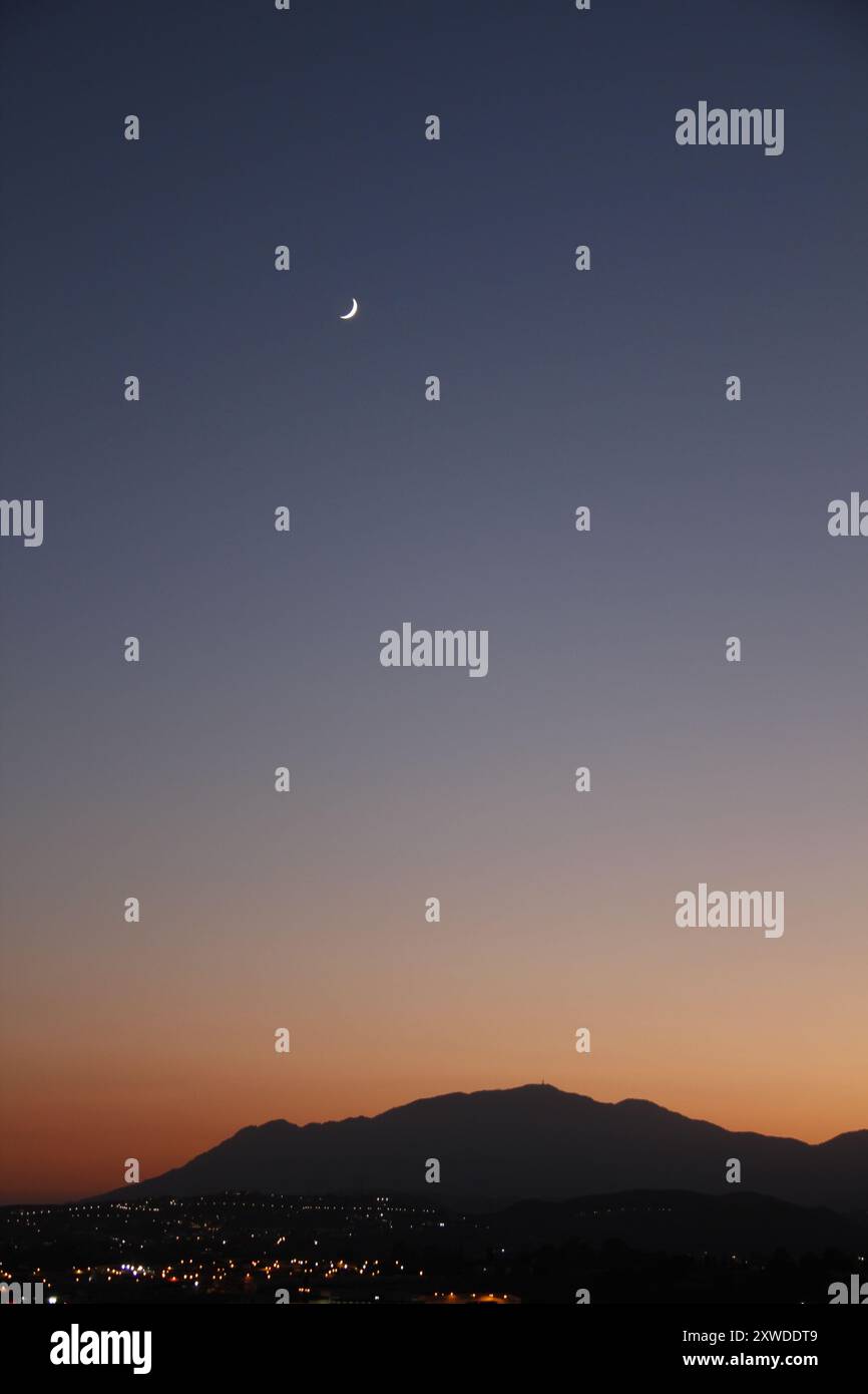 Crescent moon rising on Costa del sol and Marbella Stock Photo - Alamy