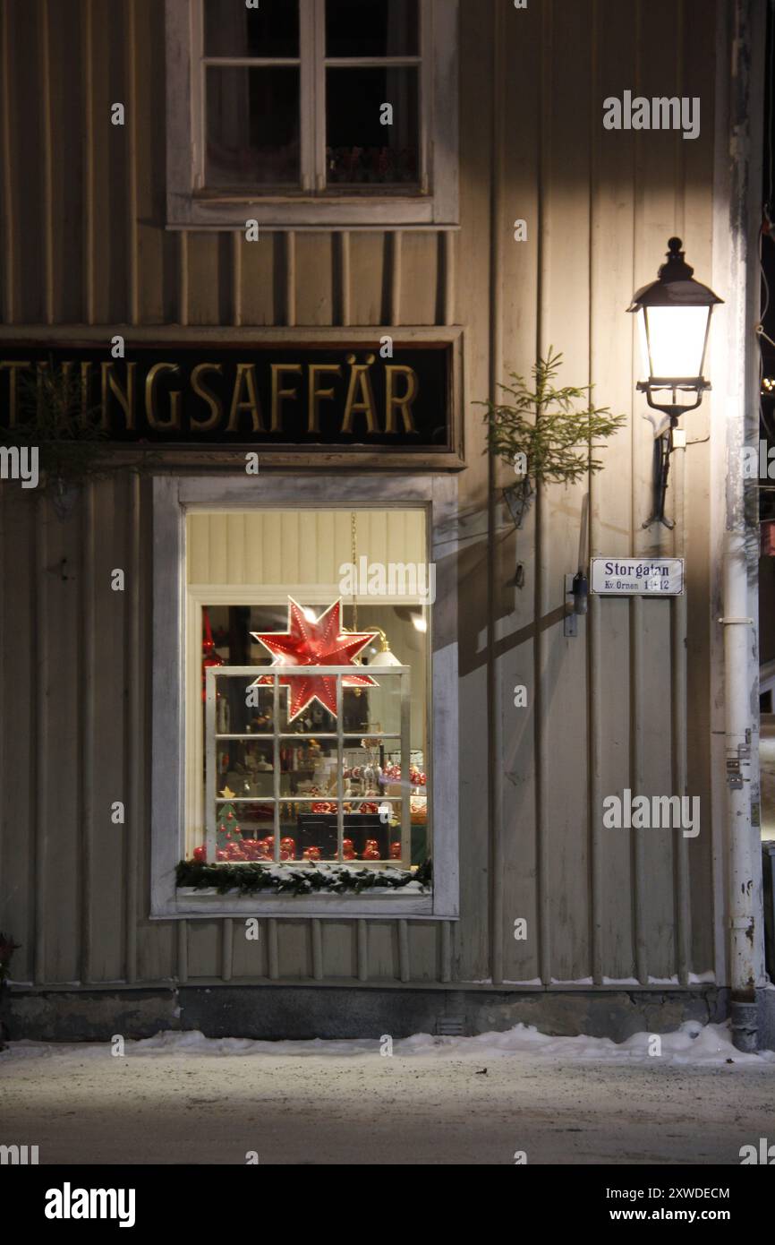 Illuminated Christmas store windows in quaint little Swedish town of ...
