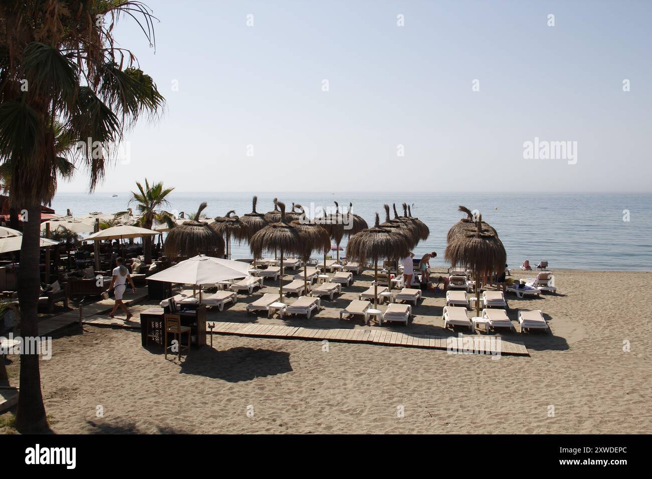 Luxury resort beach sun loungers hi-res stock photography and images ...