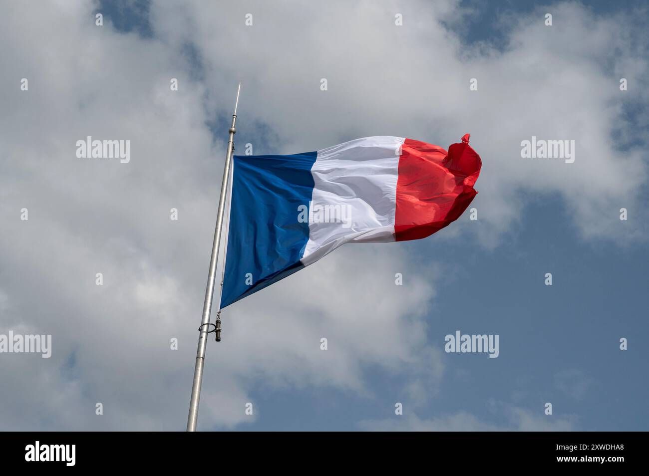 French national flage (Tricolore) waving high above the citadel of ...