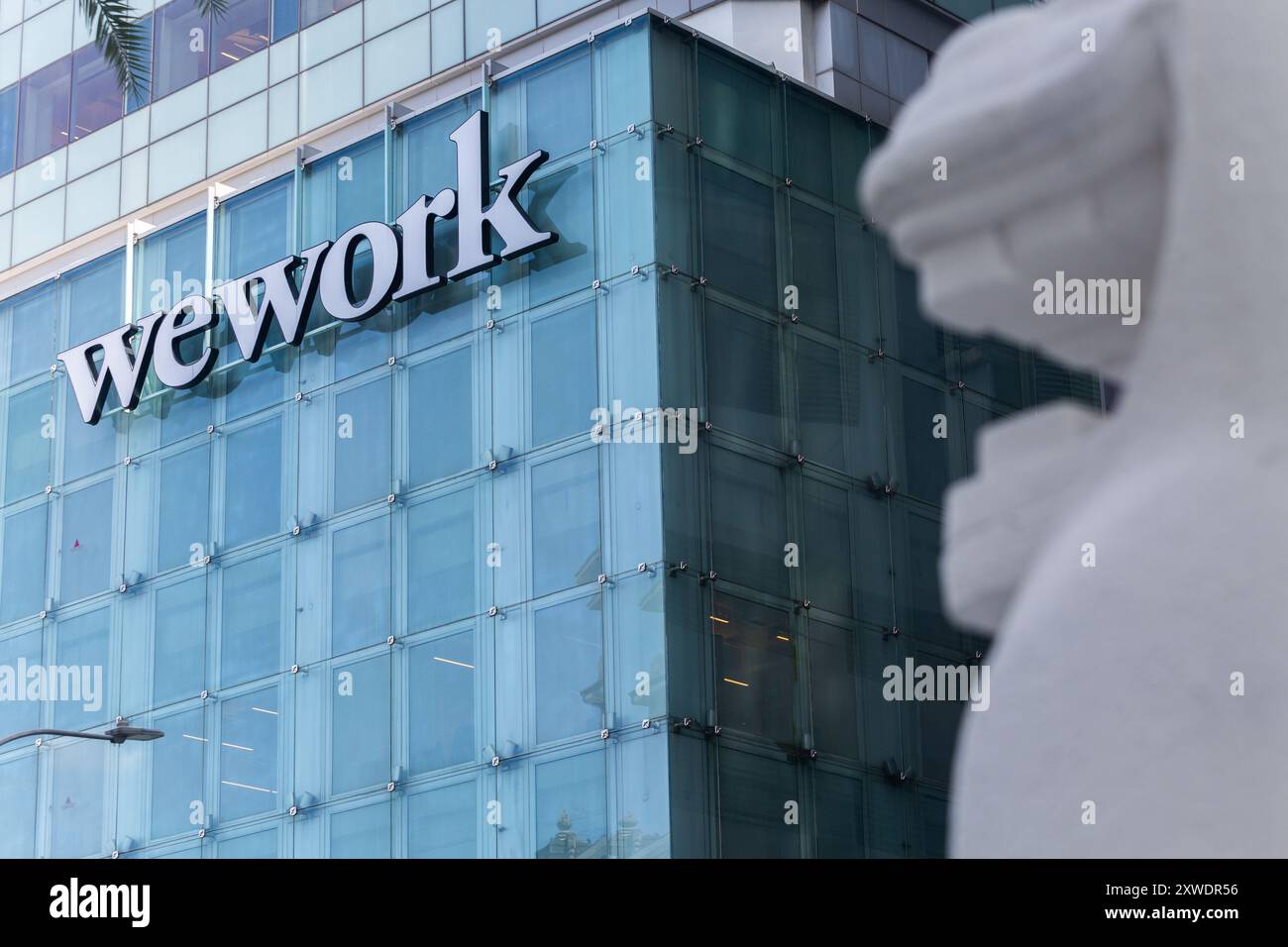 19 Aug 2024. Wework signage attached on curtain walls. Real estate ...