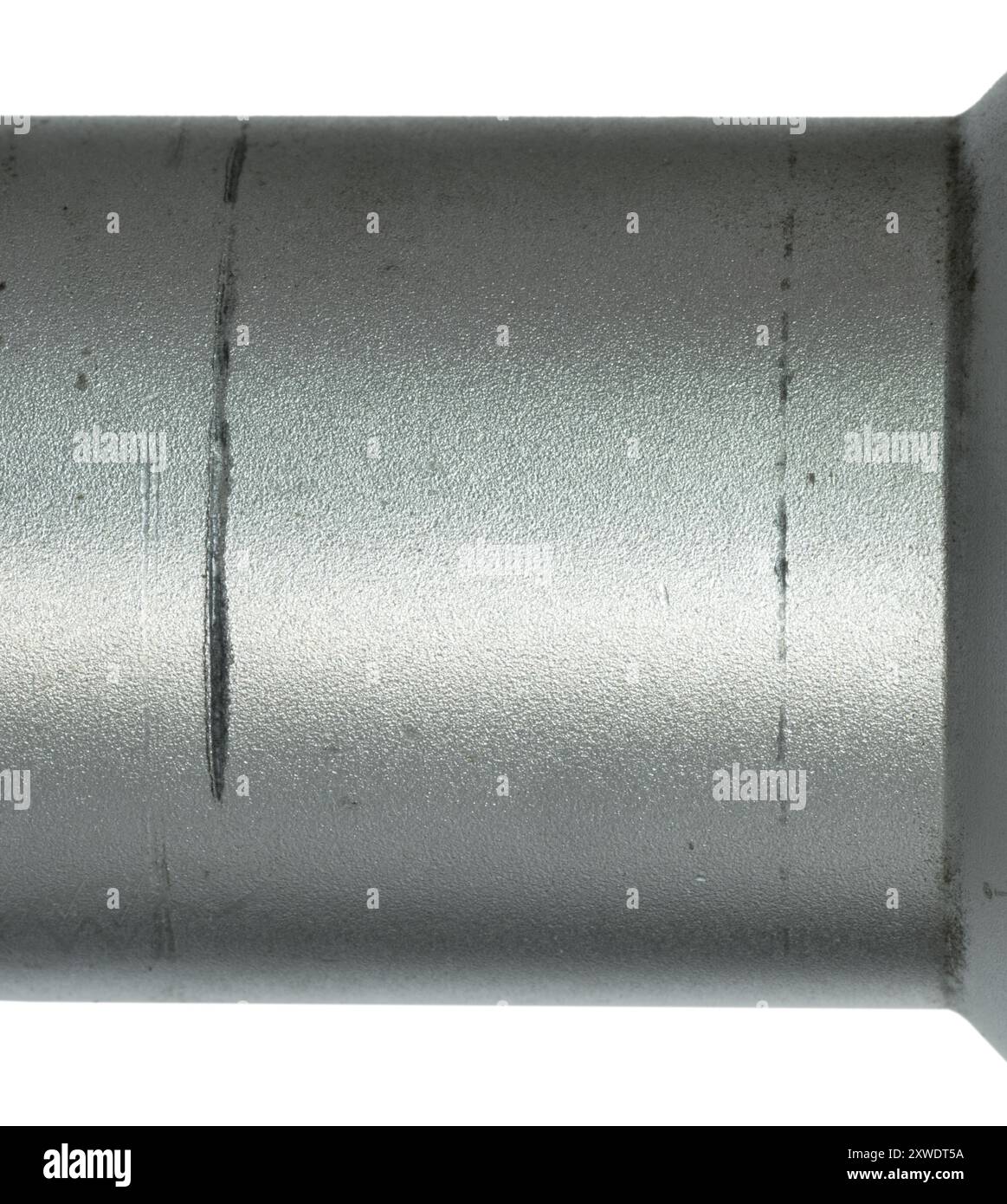 Scratches caused by overtightening rings on a silver colored magnified ...