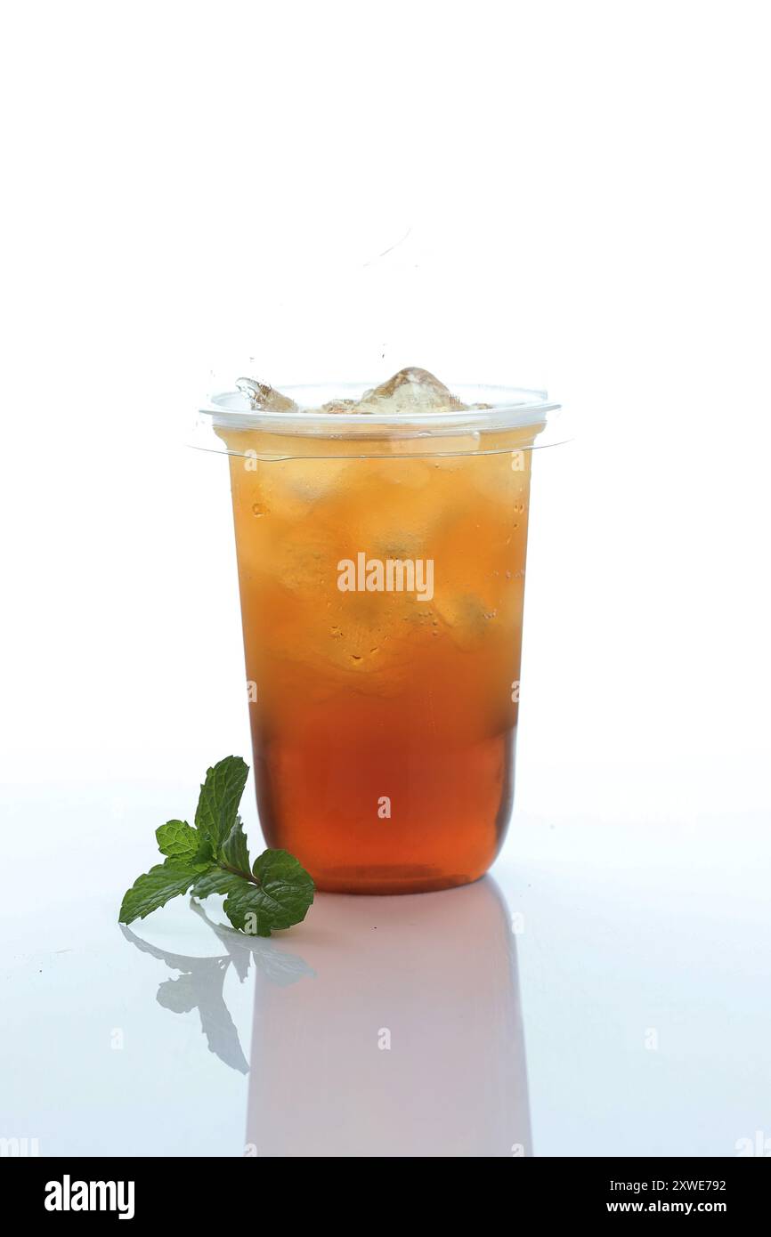 Cold Ice Tea with Mint Leaf on White Table, Isolated Es Teh Stock Photo ...