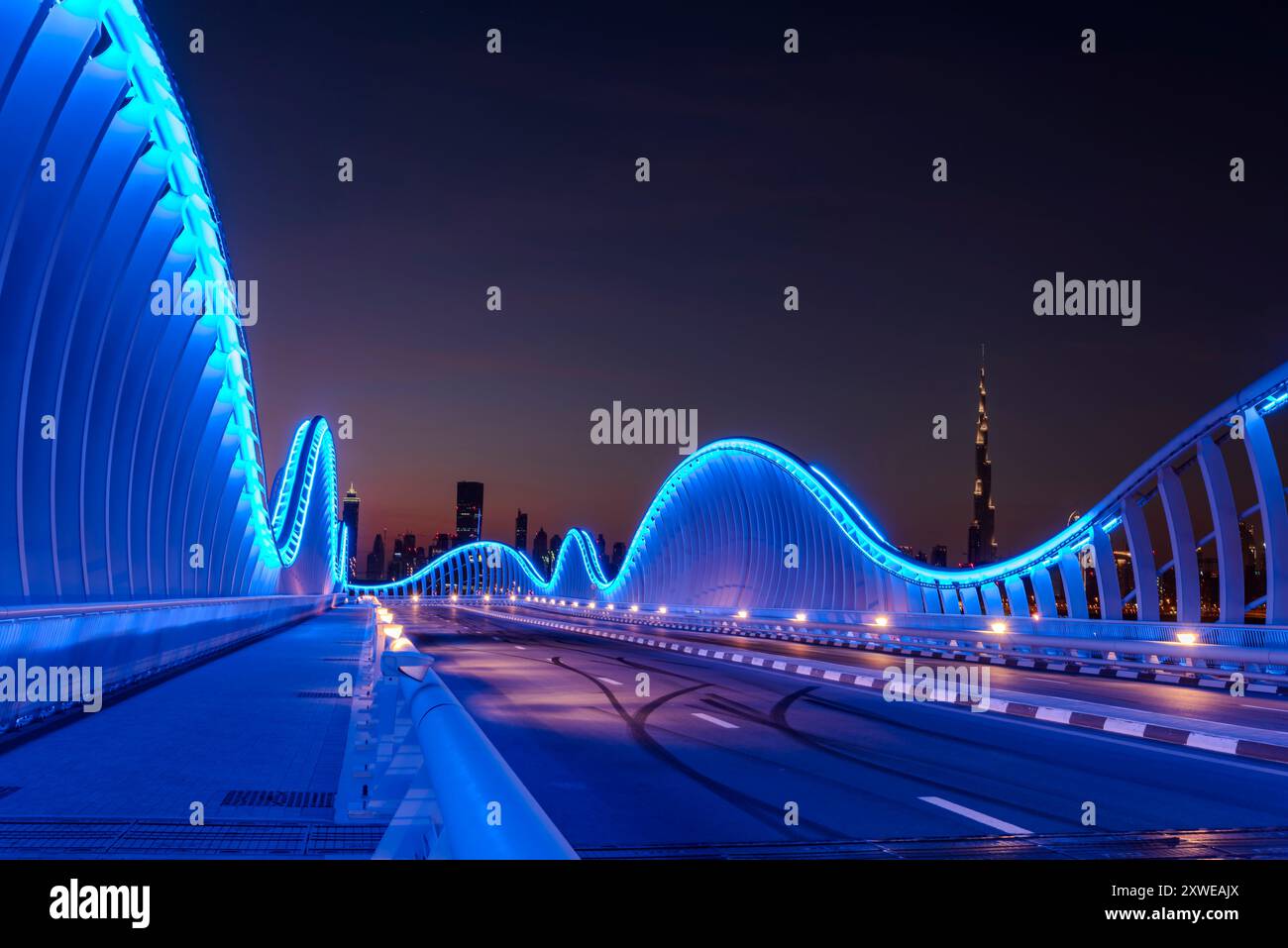 Dubai, United Arab Emirates, 3 Apr 2015. Meydan Bridge illuminated in ...