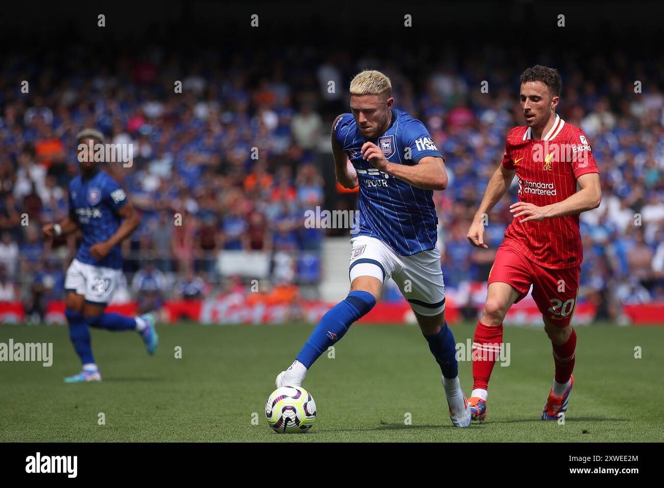 Wes Burns of Ipswich Town and Diogo Jota of Liverpool - Ipswich Town v ...