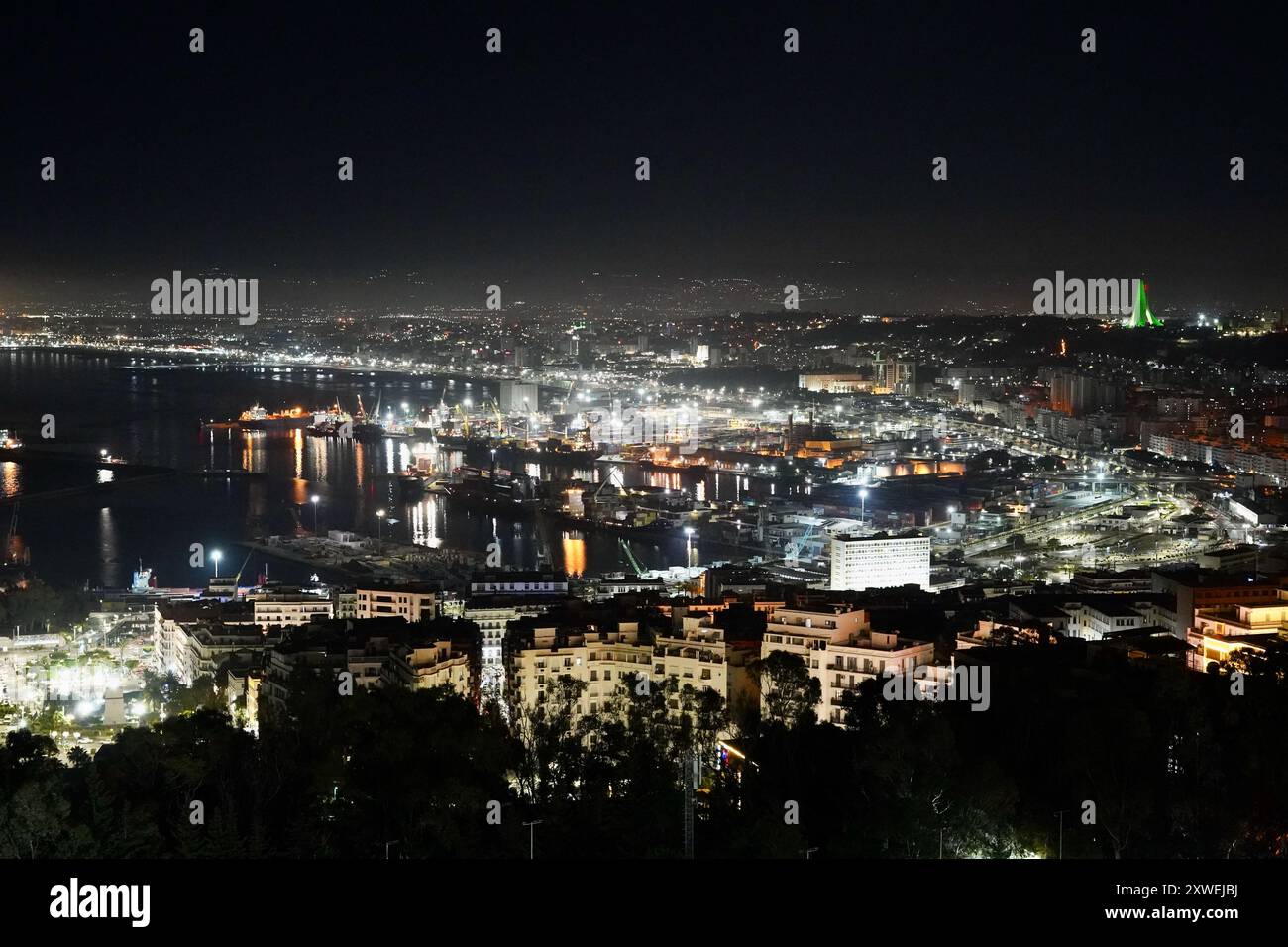 Port of Algiers at night showing the city lights Stock Photo - Alamy