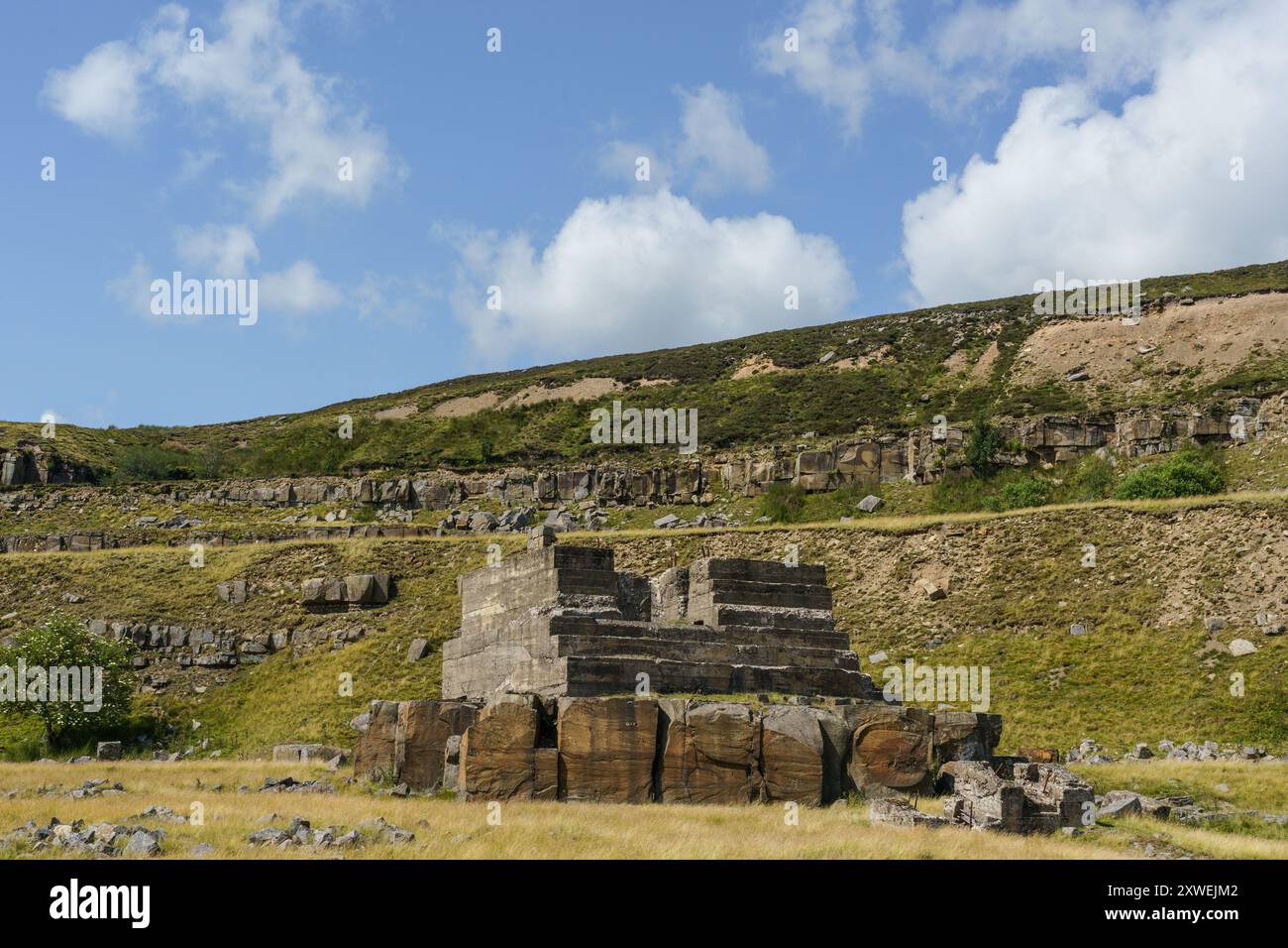 Ruins of an old, unknown stone building in a rugged landscape near a ...