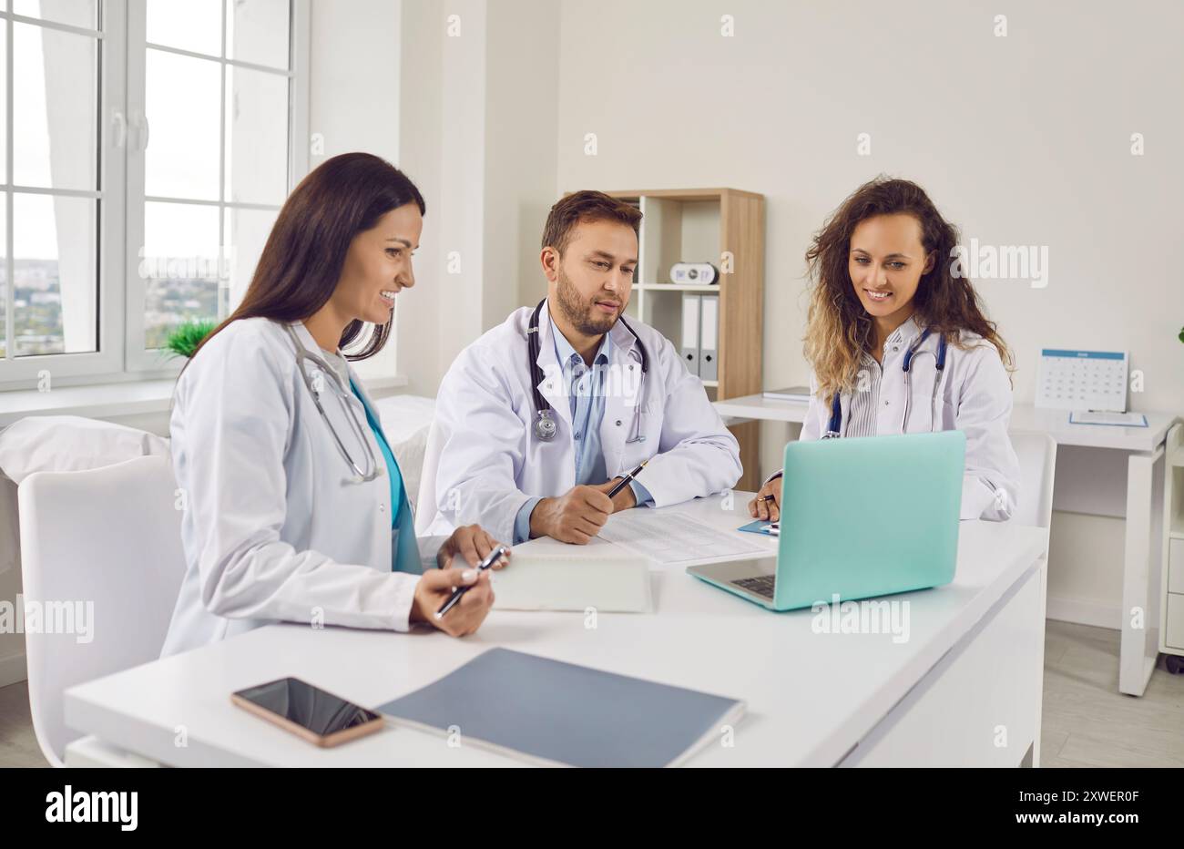 Medical Team Collaboration at Hospital Office Stock Photo - Alamy