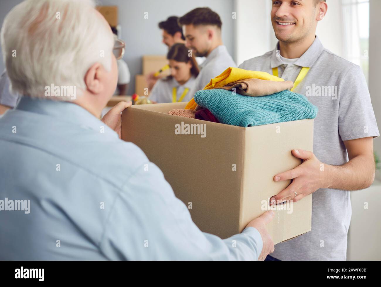 Things box charity man hi-res stock photography and images - Alamy