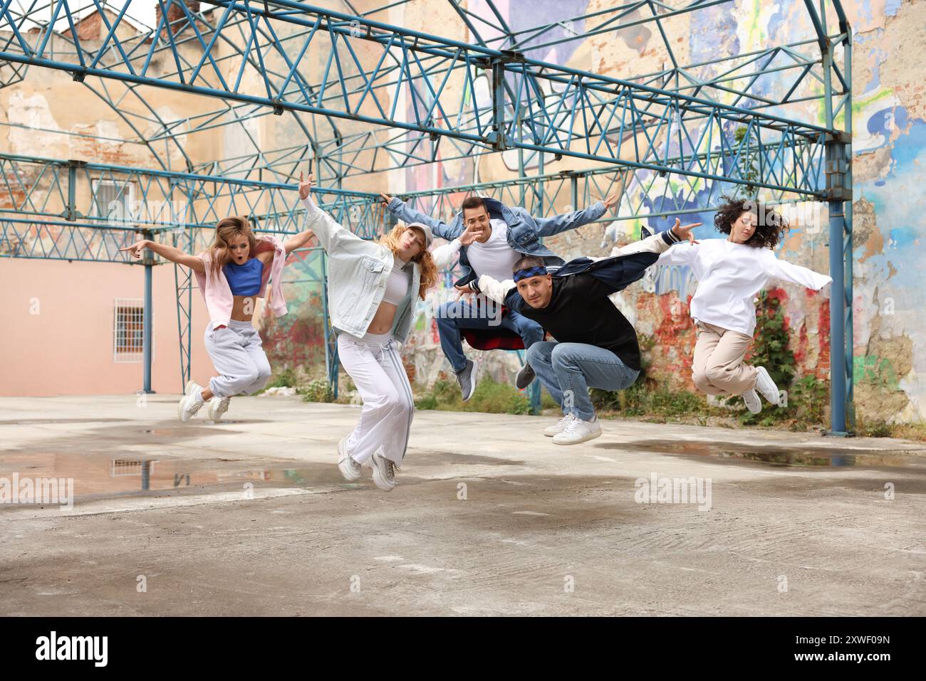 Group of people dancing hip hop outdoors Stock Photo - Alamy
