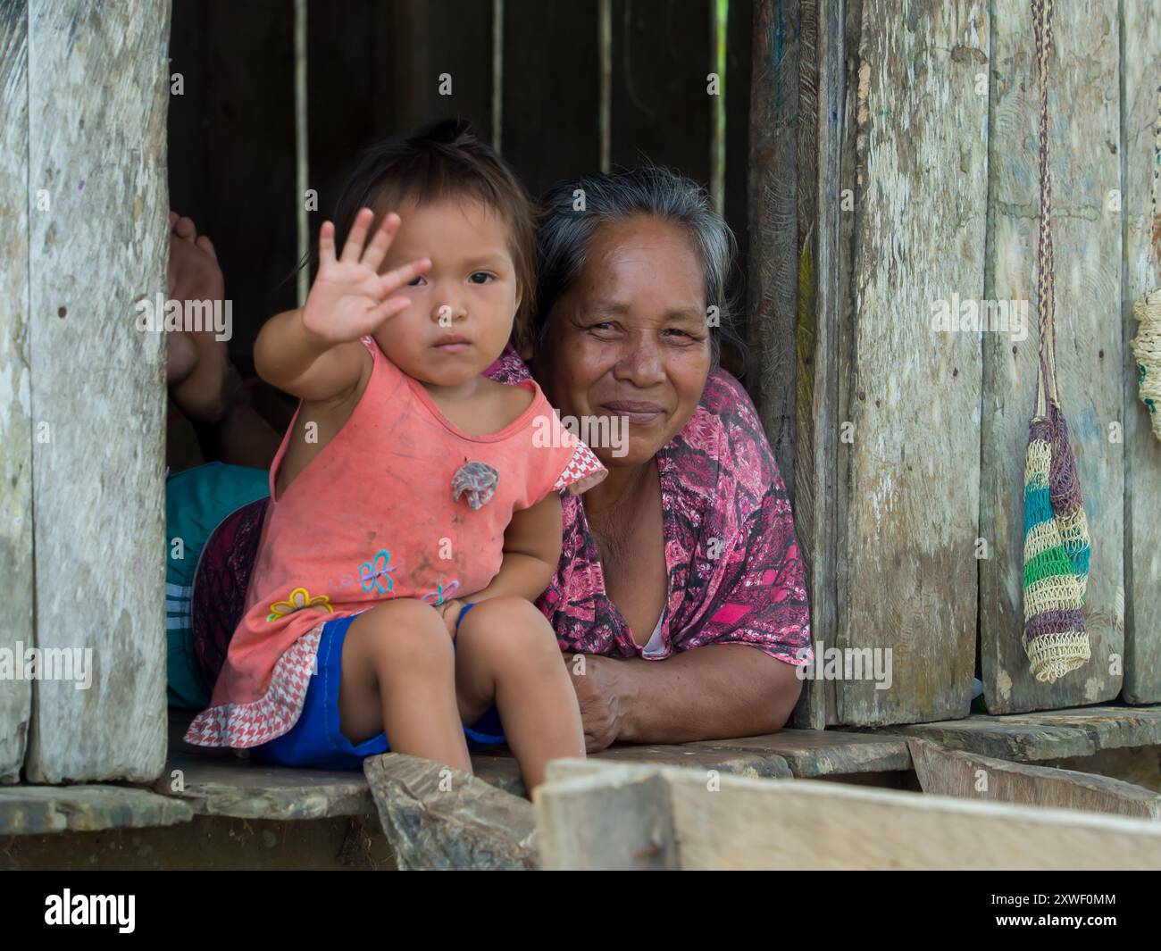 Santa Rita, Peru - Sep 2017: Portrait of a child and grandmother a ...