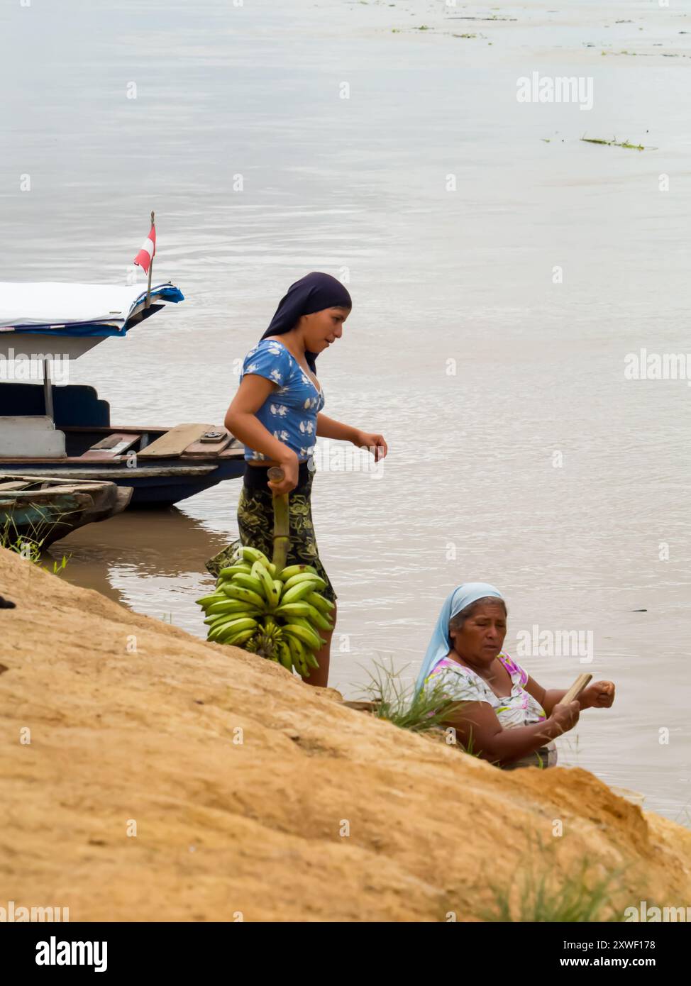 Amazonia, Peru - Dec, 2017: Local people in a small village on the ...
