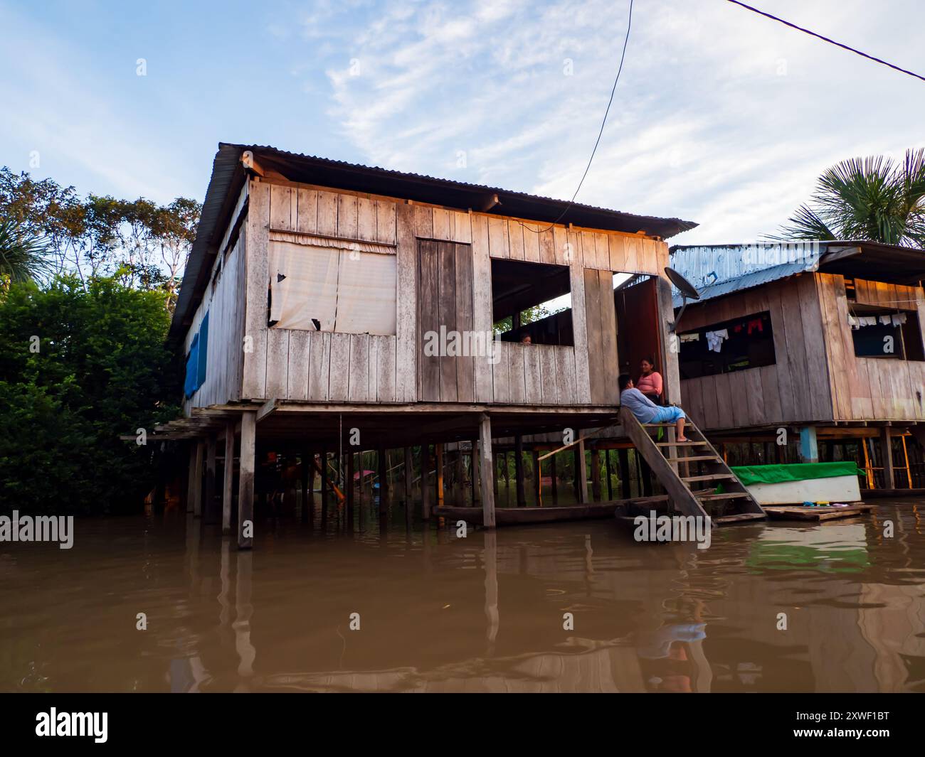 Liberdad village, Peru - Apr, 2022: Typical wooden cottages on the ...